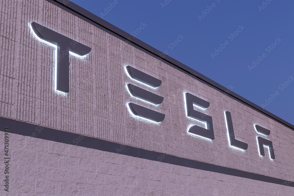 Tesla electric vehicles logo. Tesla products include electric cars ...