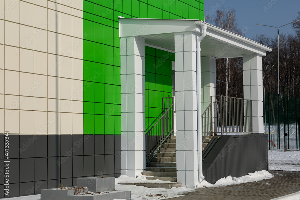 entrance group with a flight of stairs and a visor against the ...