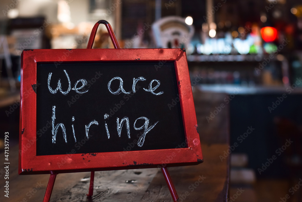We are hiring sign on chalkboard in a restaurant Stock Photo | Adobe Stock