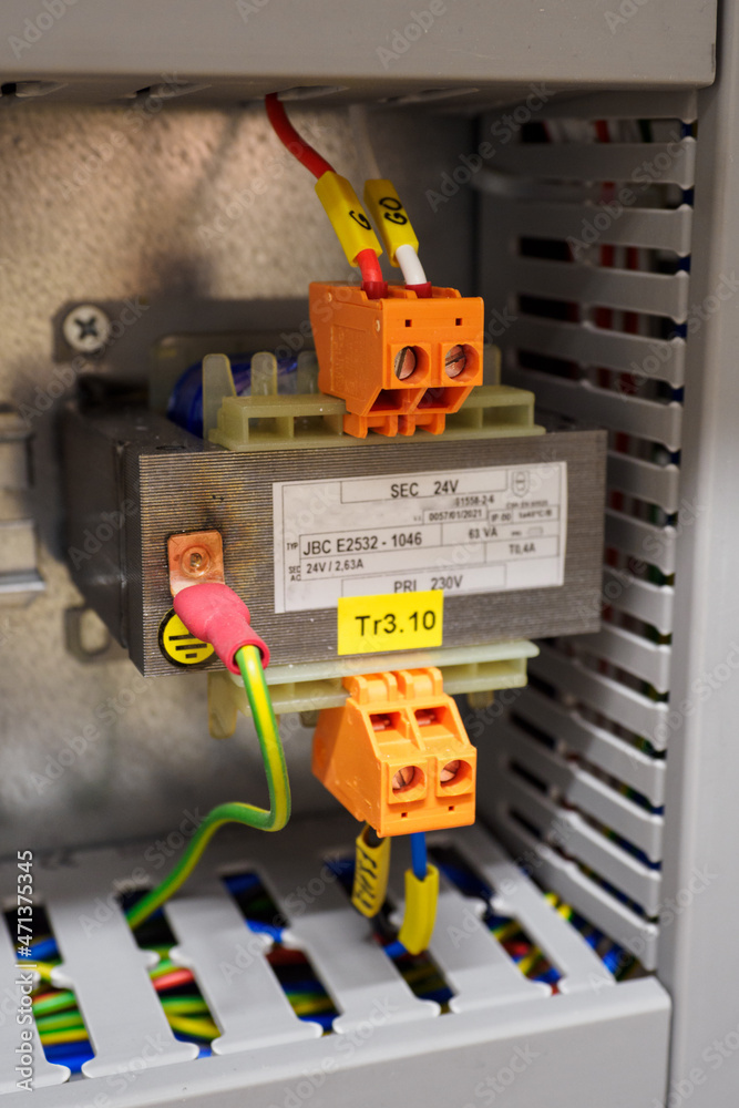 Small transformer changing voltage from 230V to 24V in the switchboard ...