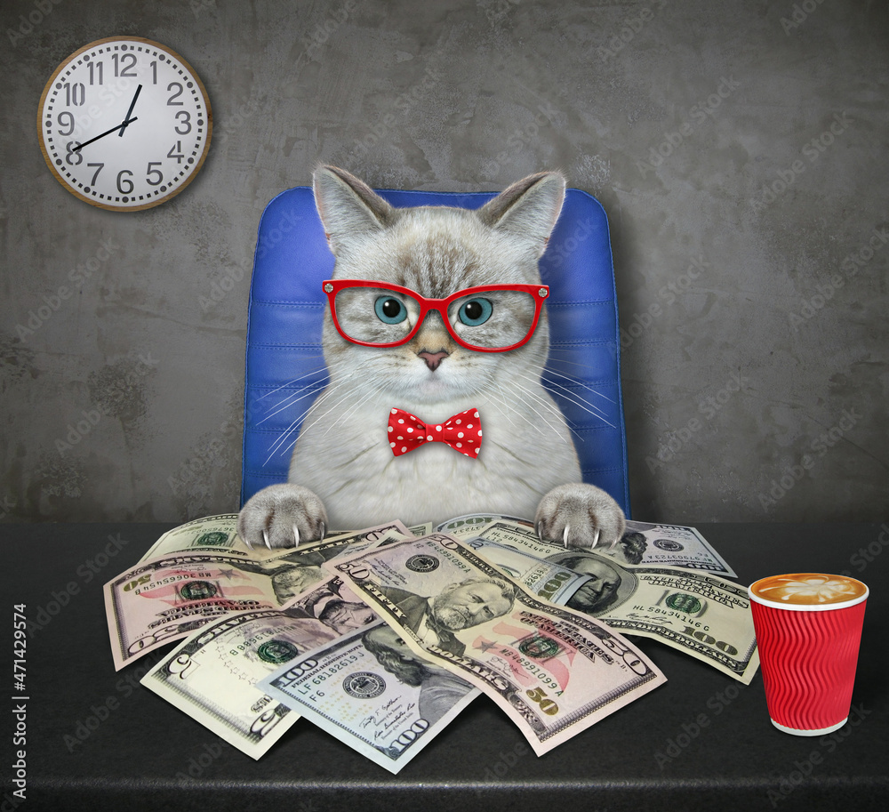 An ashen cat businessman in a red bow tie and glasses sits at a desk in ...