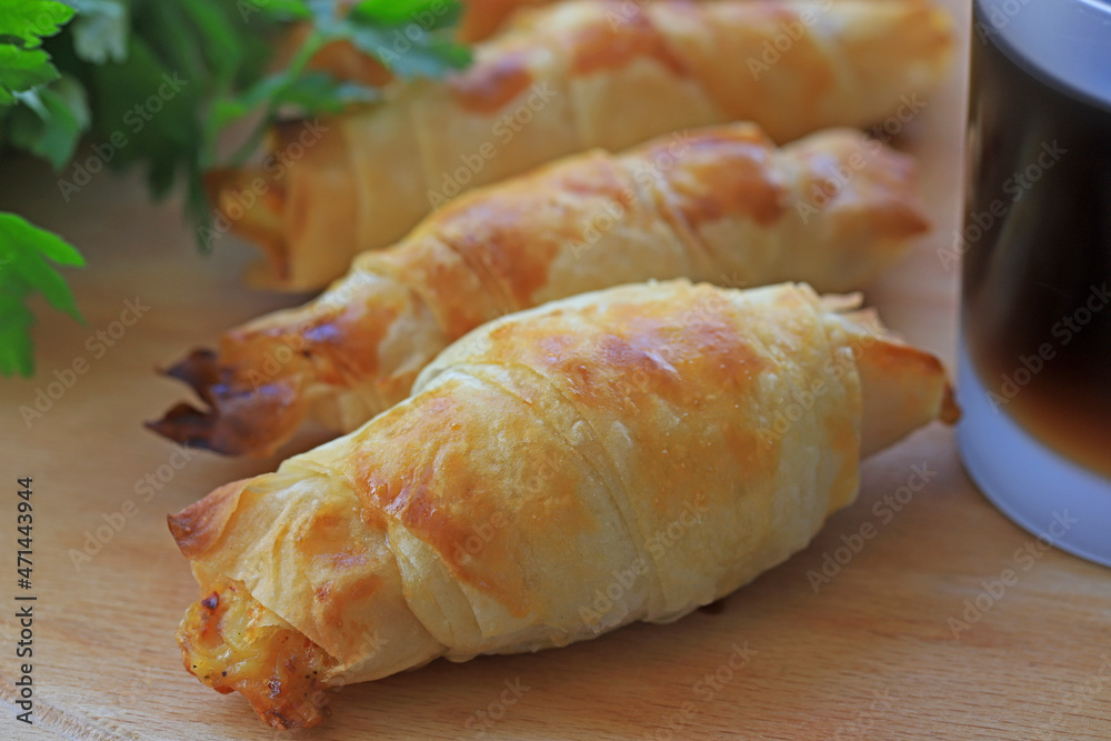 Turkish style potato pie in the form of a roll, made by wrapping dough ...