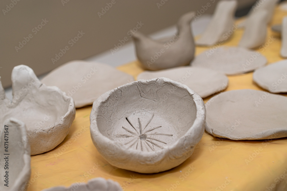 ceramic souvenirs and jewelry in the work process of handmade ...