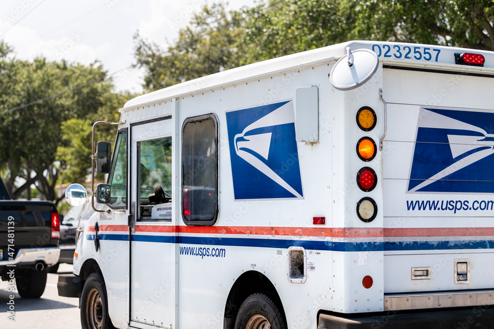 West Palm Beach, USA - July 8, 2021: Small USPS van truck delivering ...
