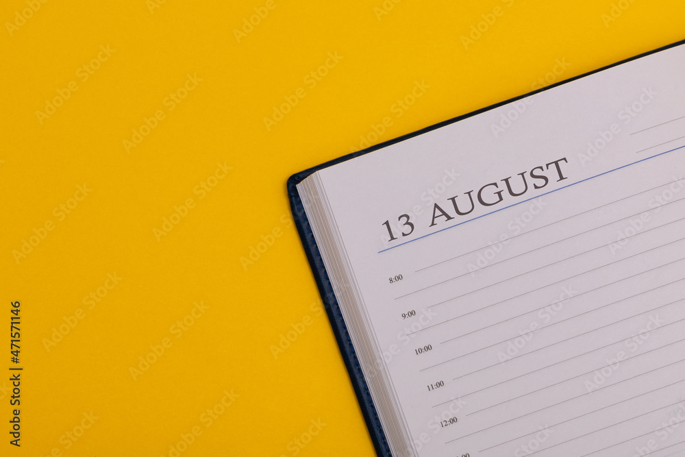 Notepad or diary with the exact date on a yellow background. Calendar ...
