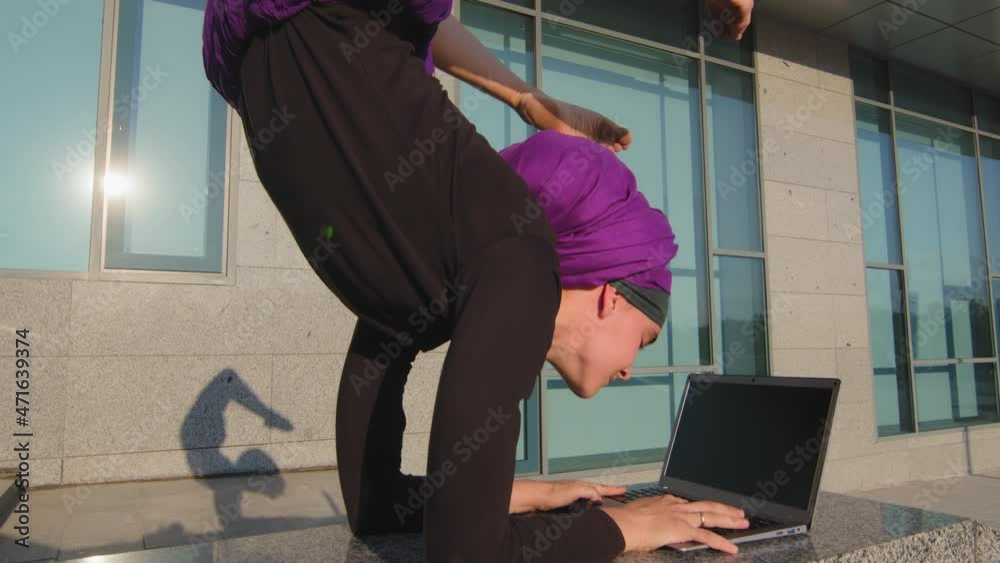 Moving footage muslim girl student business woman in hijab works typing ...