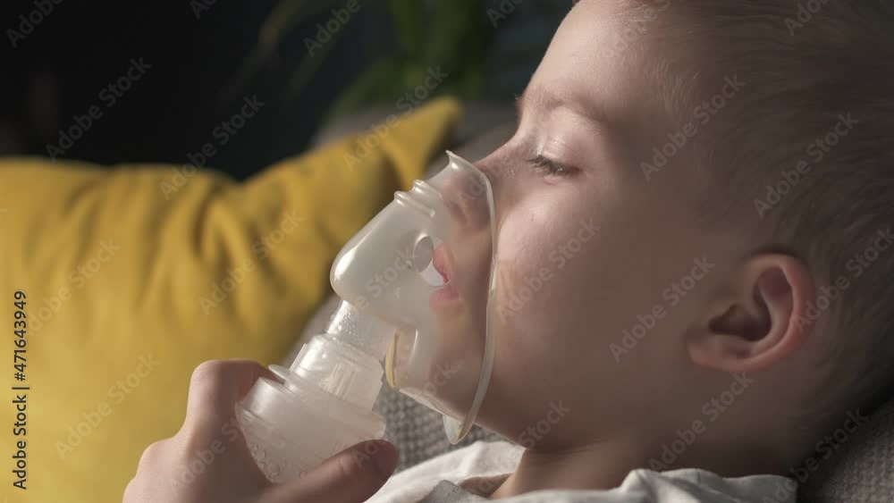 Child does the lung inhalation procedure at home. Inhalation when ...