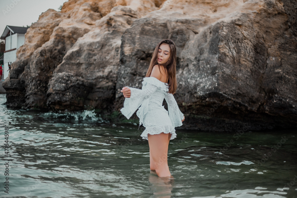 beautiful girl on the beach (sea / ocean) Stock Photo | Adobe Stock
