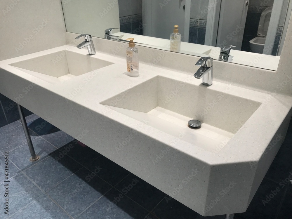 stone marble finishes on wash basin counter top counter for an office ...