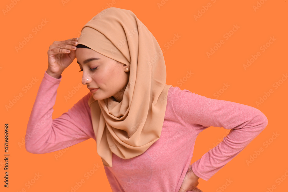 young muslim girl wearing hijab stretching back and relaxed indian ...