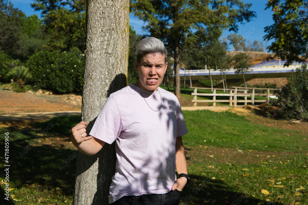 gender non-binary and androgynous person doing different postures and ...