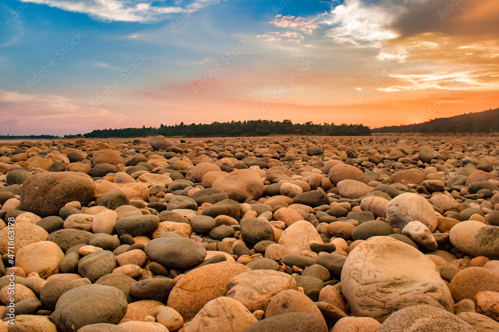 Beautiful riverside stone view in the afternoon with blue sky ...