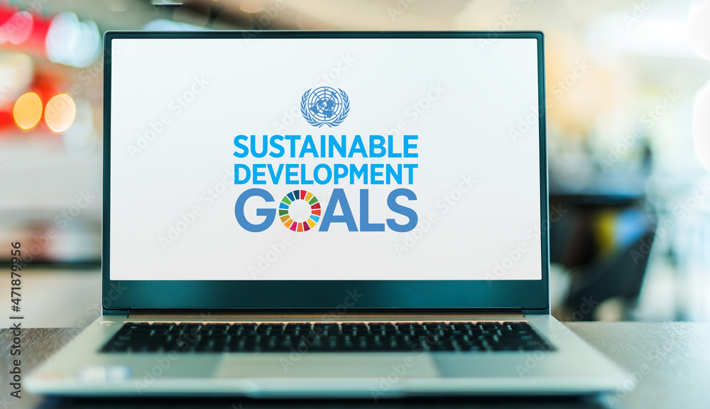 Laptop displaying logo of The Sustainable Development Goals Stock Photo ...