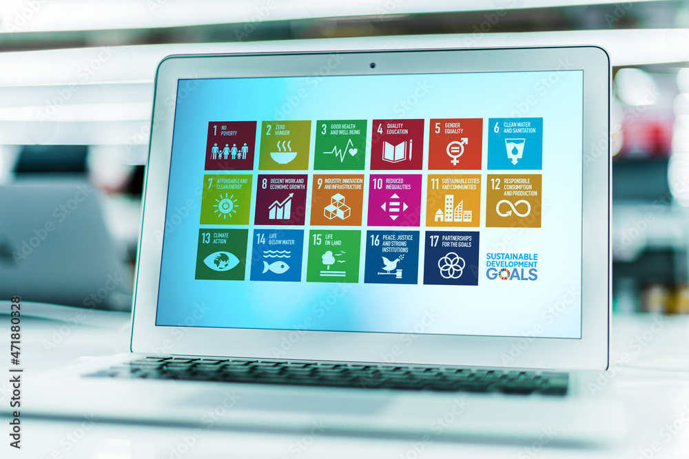 Laptop displaying logo of The Sustainable Development Goals Stock Photo ...