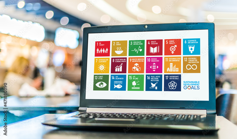Laptop displaying logo of The Sustainable Development Goals Stock Photo ...