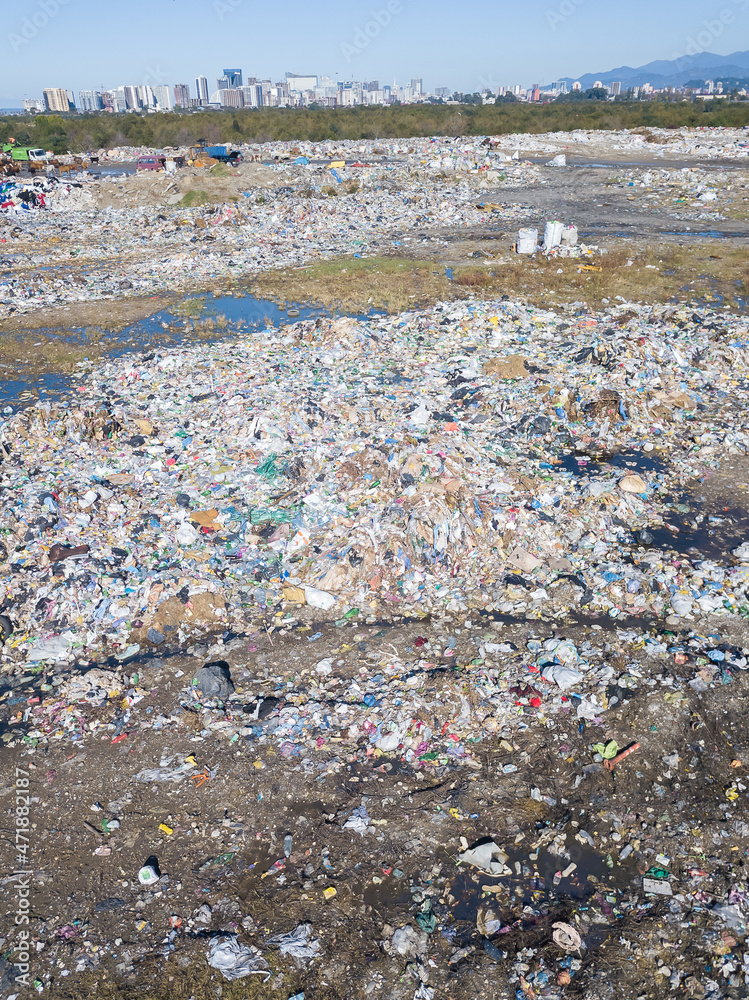 Drone view of a large landfill, a pile of garbage. Household waste in a ...