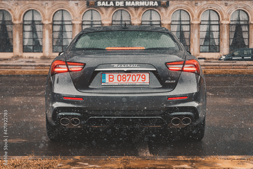 Maserati Ghibli Hybrid rear view, stop lights, wheel and exhaust ...