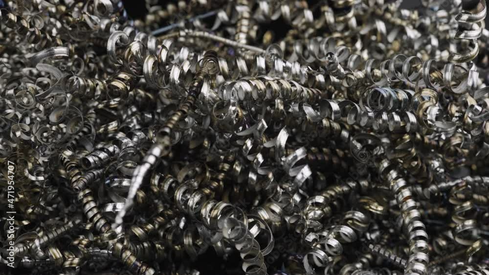 Metal shavings, twisted steel colored aluminum spirals. Steel scrap ...