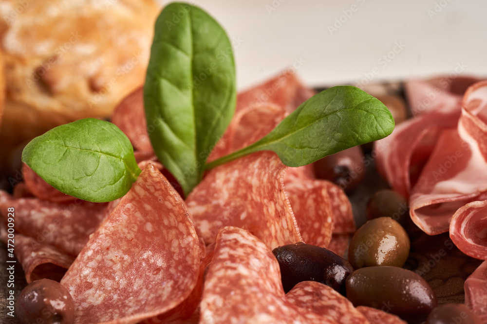 Cold cuts of ham and salami Stock Photo | Adobe Stock