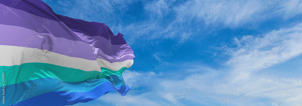 xe fae lesbian pride flag waving in the wind at cloudy sky. Freedom and ...