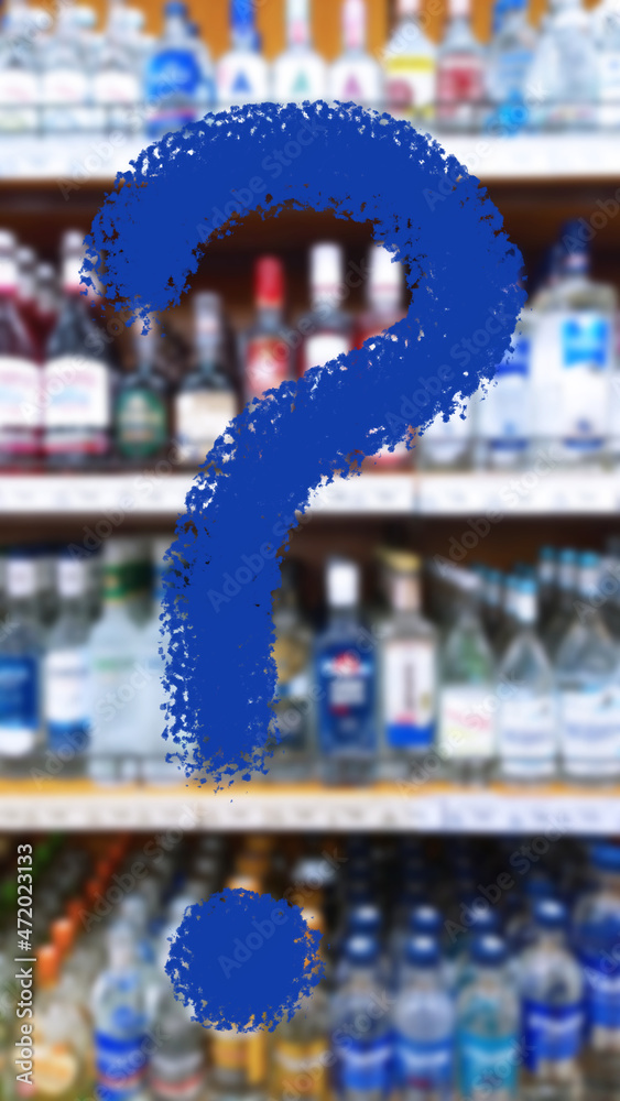 Large blue question mark on abstract blur image of supermarket ...