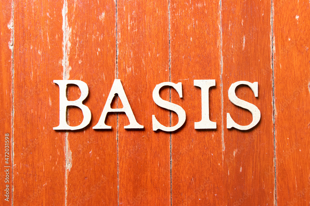 Alphabet letter in word basis on old red color wood plate background ...