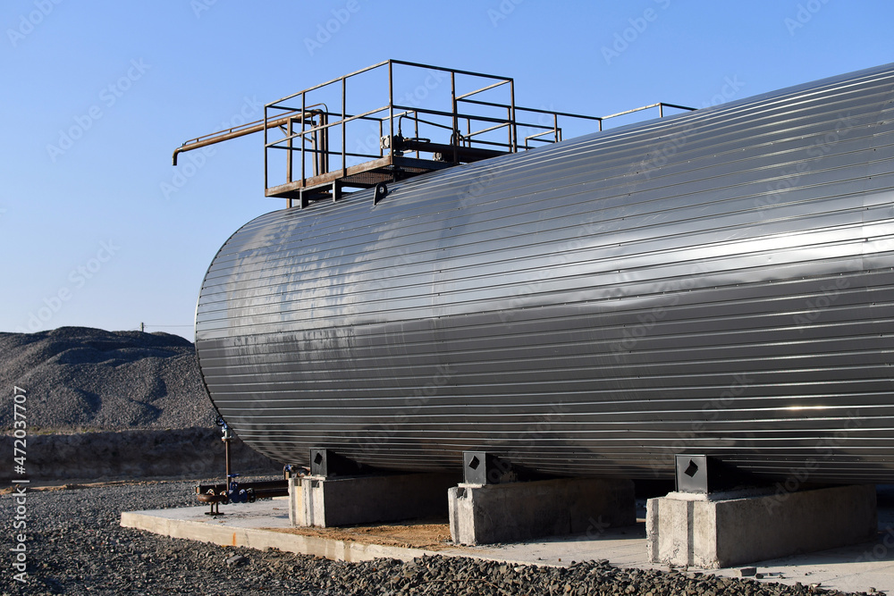 Big overground storage tanks for bitumen. Bitumen is a residual ...