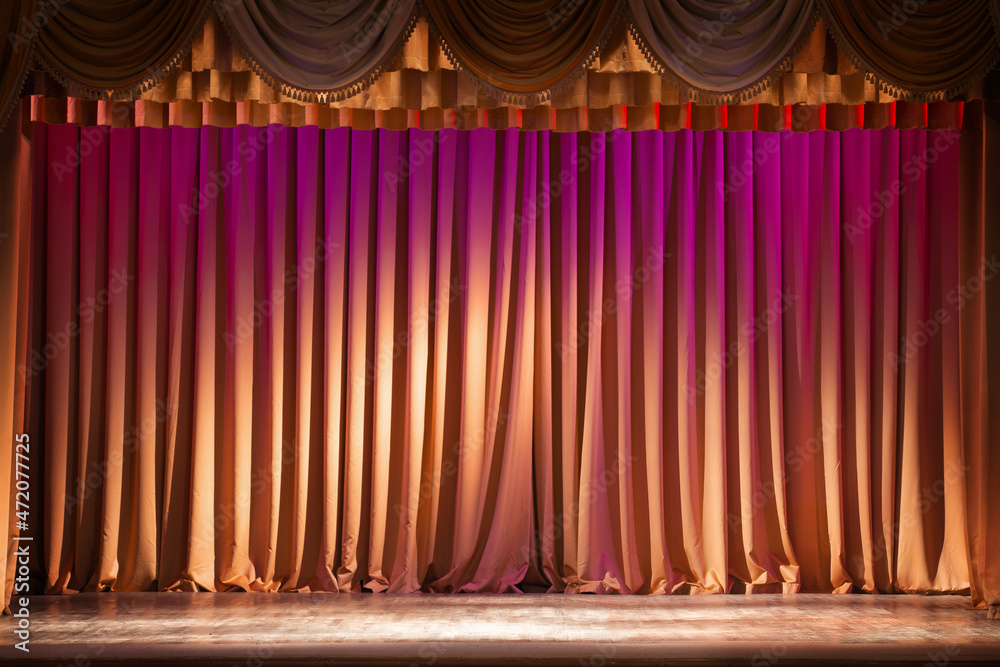 illuminated by lights stage with backstage and decorative columns ...