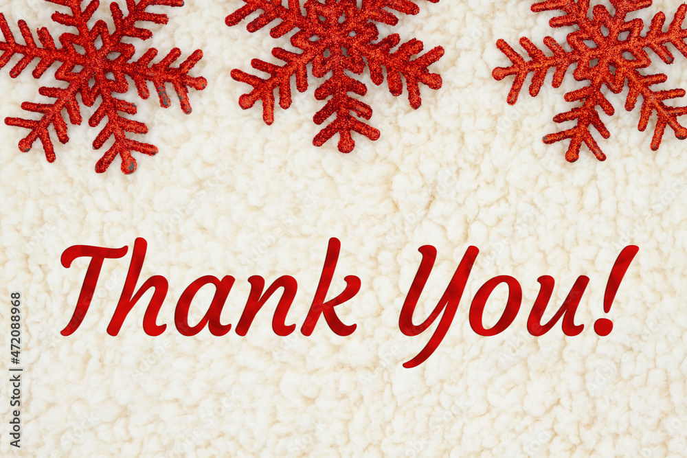 Thank you message with red snowflakes on beige sherpa material Stock ...