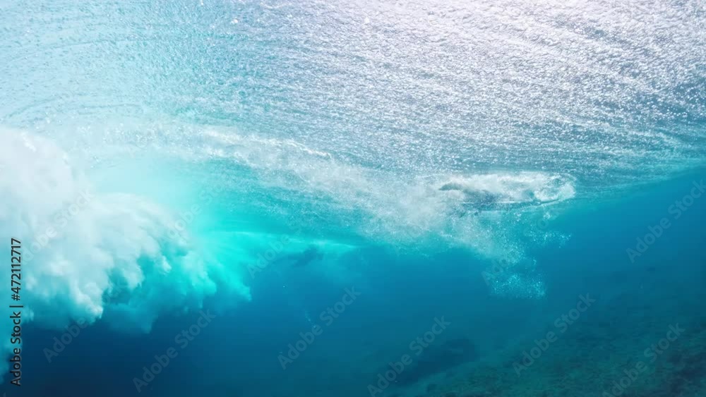Ocean wave. Crystal clear ocean wave rolls and breaks. Underwater view ...
