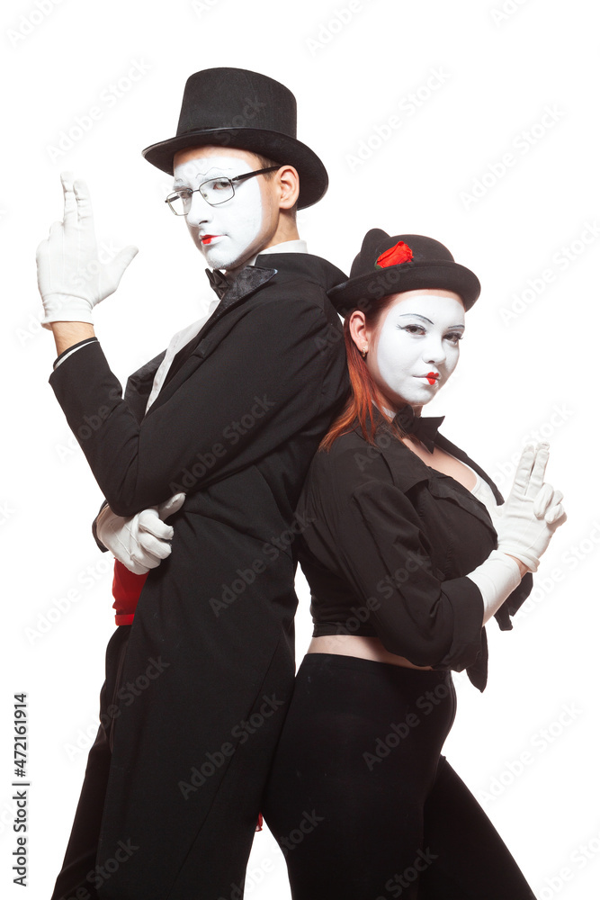 Portrait of two mime artists performing, isolated on white background ...