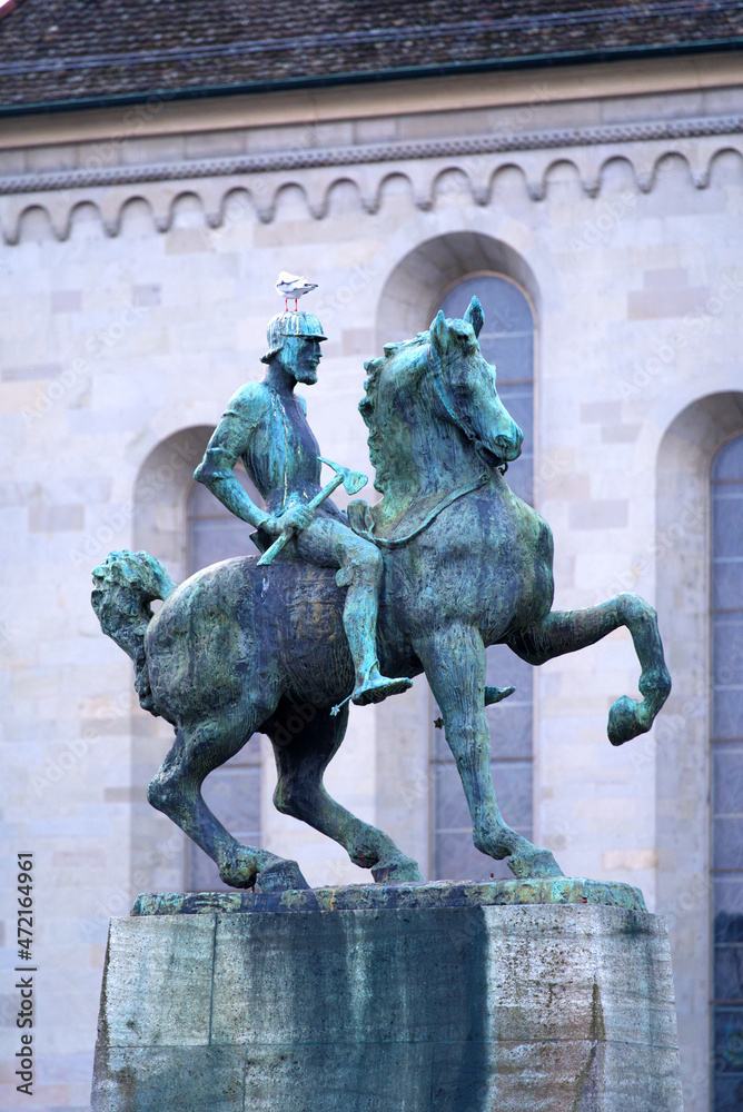 Bronze statue on pedestal stone of medieval mayor of Zürich named Hans ...