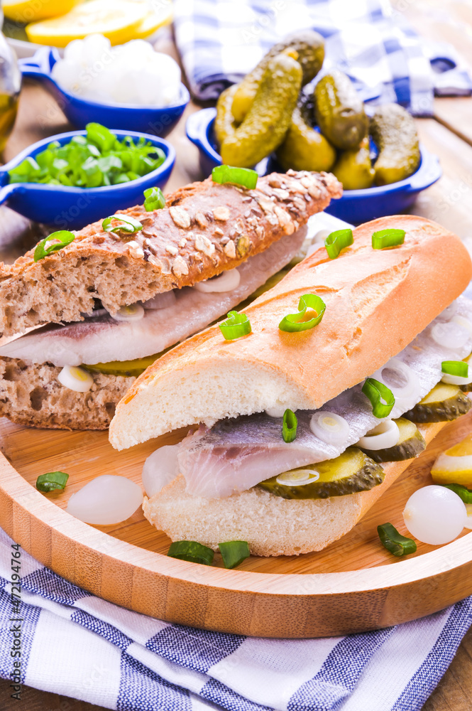 Dutch herring. Toast with Dutch herring, onions, pickles. Traditional ...