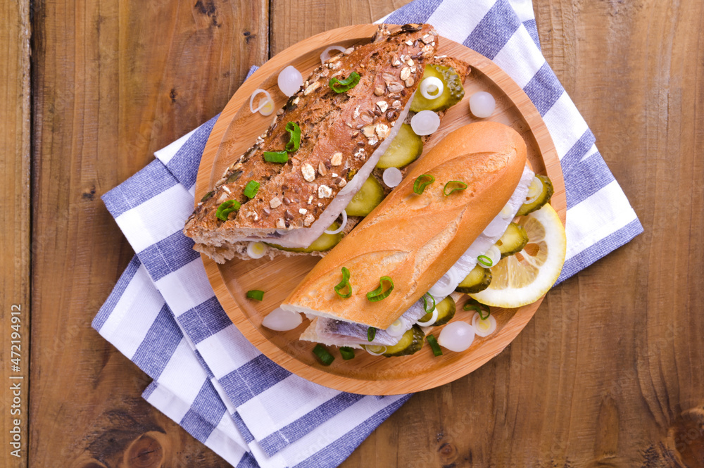 Dutch herring. Toast with Dutch herring, onions, pickles. Traditional ...