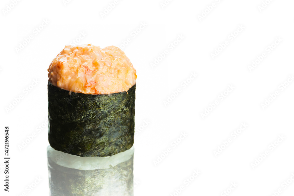 Gunkan sushi with salmon and rice wrapped in nori seaweed. Japanese traditional cuisine. Asian ...