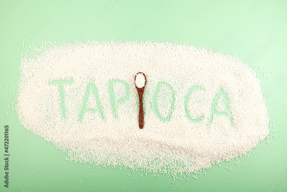 Inscription Tapioca of tapioca pearls on green background. White small ...