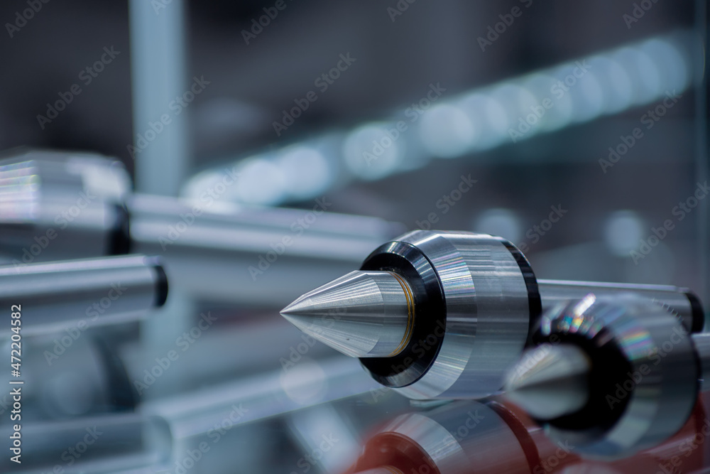 The center is rotating. Revolving lathe center for mounting and ...