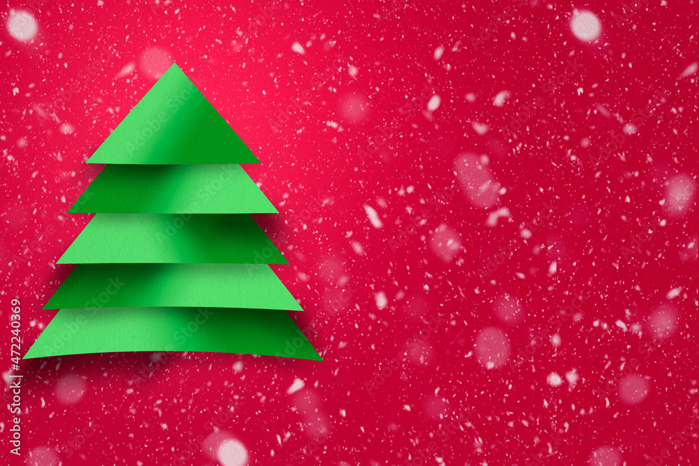 Design of green christmas tree with paper texture and snowy background ...