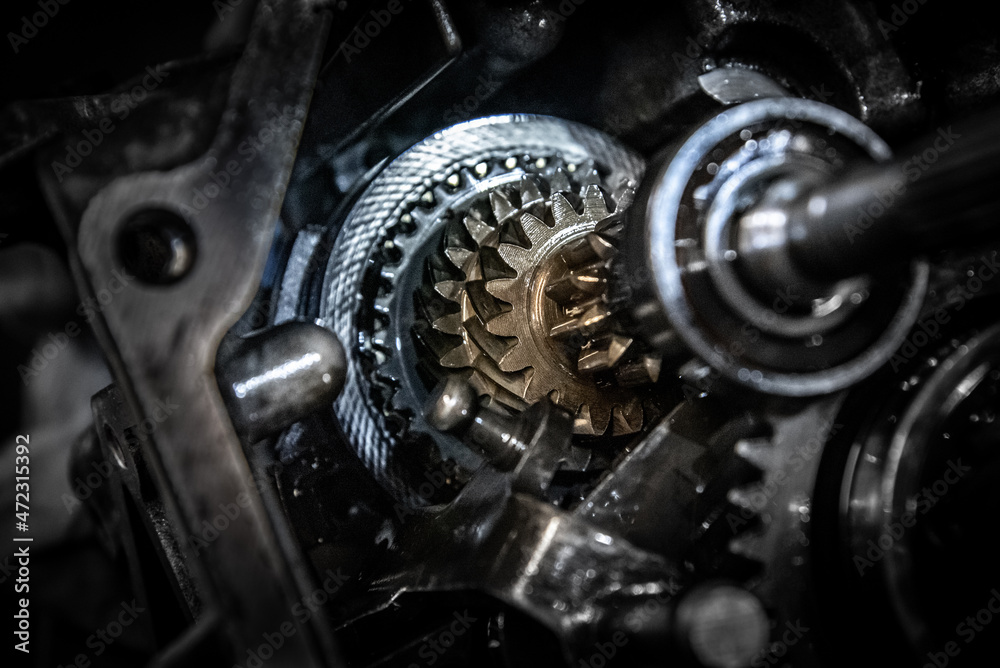 Car transmission, gearbox with visible gears and cogs in the garage ...