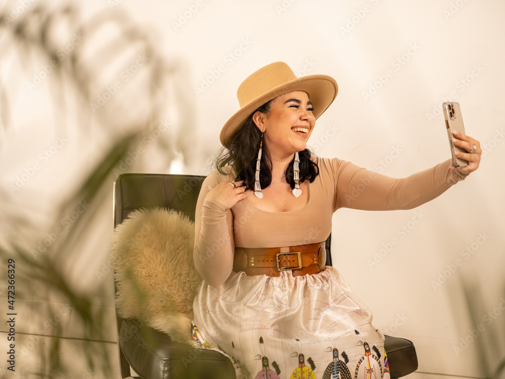 Young Indigenous female model indoors Stock Photo | Adobe Stock