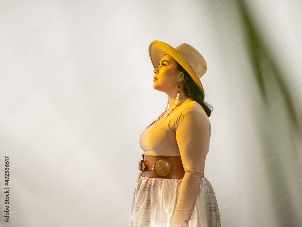 Young Indigenous female model indoors Stock Photo | Adobe Stock