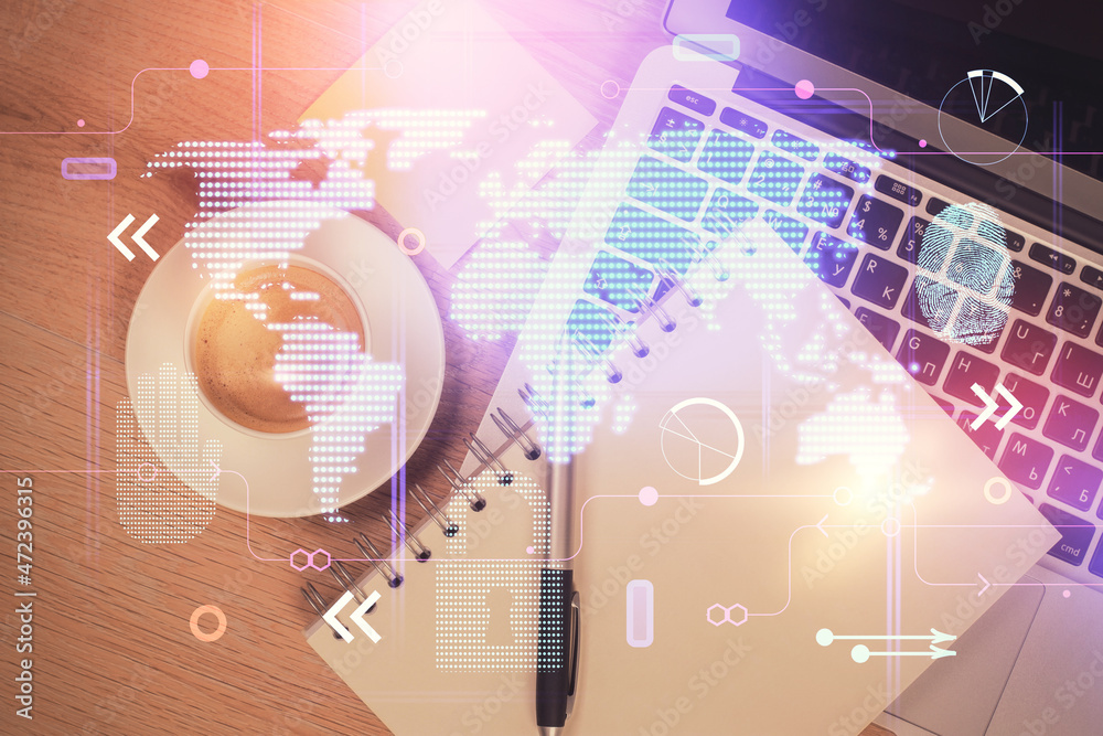 Double exposure of map hologram drawing over study table background ...