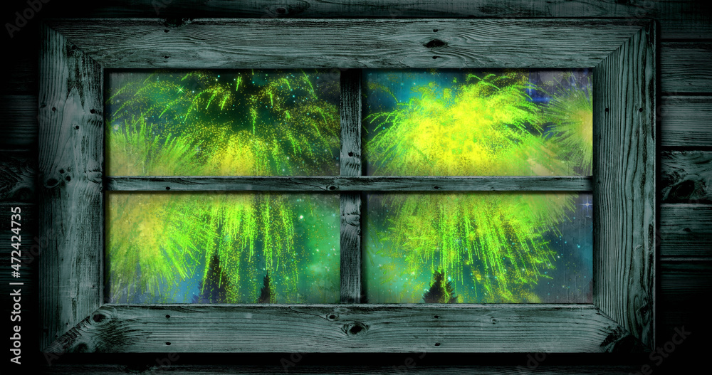 Image of window with green christmas and new year fireworks exploding ...