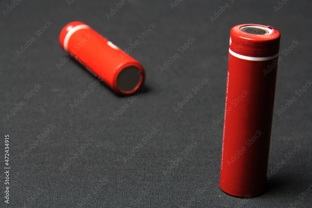 Lithium-ion batteries. The battery is red. Energy charge Stock Photo ...