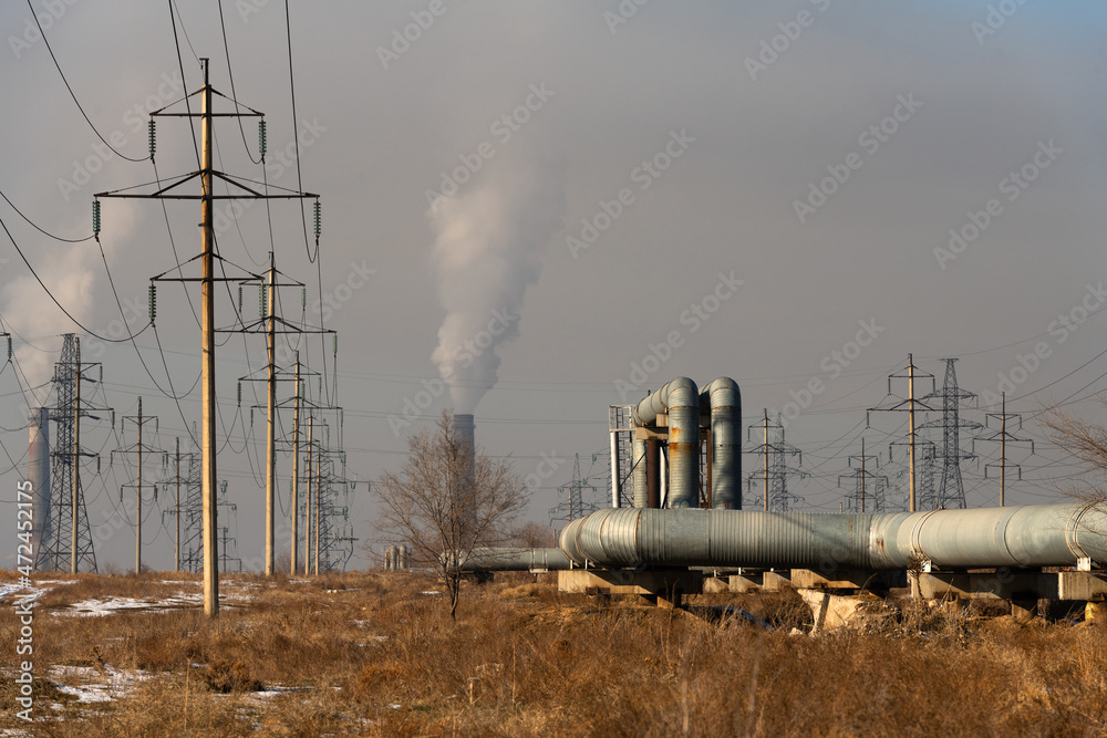 High-voltage transmission lines of electricity against the background ...