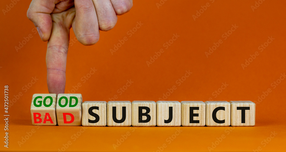 Good or bad subject symbol. Businessman turns wooden cubes and changes ...