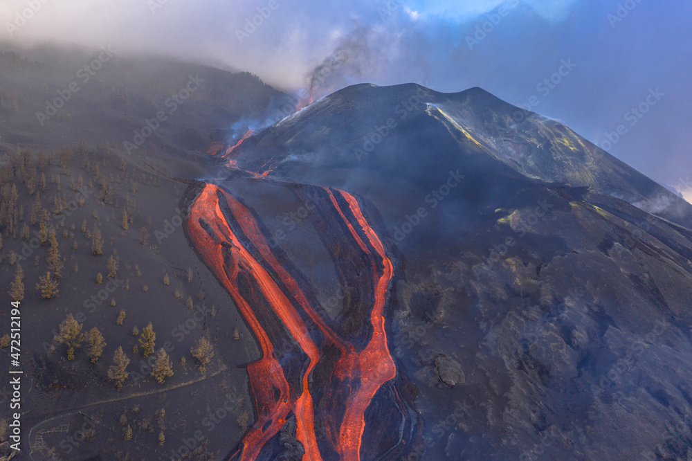Aerial top down view of lava floating down the Volcan Cumbre Vieja, a ...
