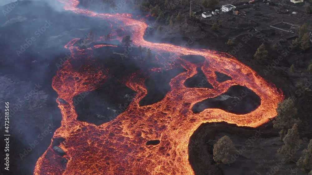 Aerial view of lava floating down the Volcan Cumbre Vieja, a volcano ...