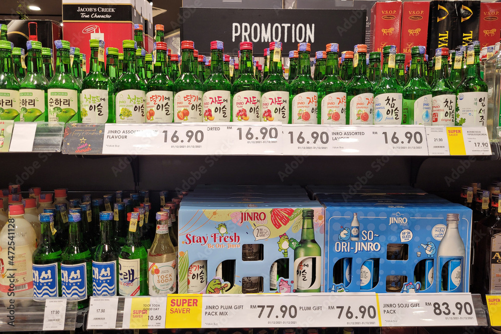 Assortment Korea wine and hard liquor bottles on store shelves in Aeon ...