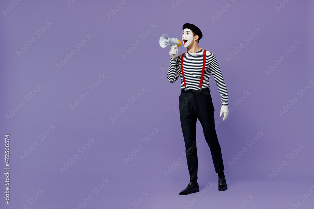 Full size body length young mime man with white face mask wears striped ...